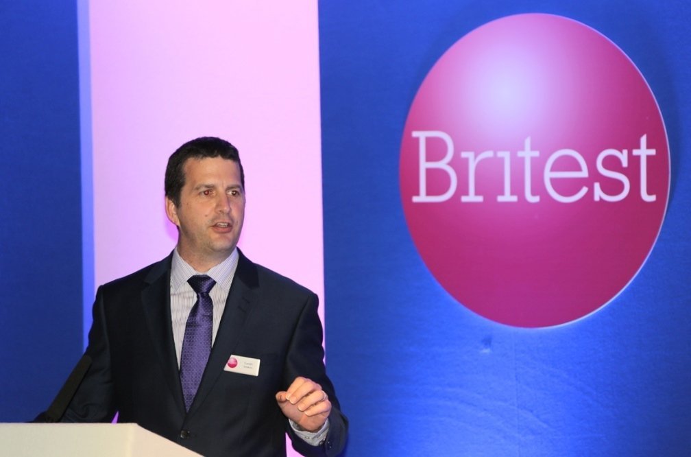 Britest - Britest CEO in chair at Continuous Flow Symposium